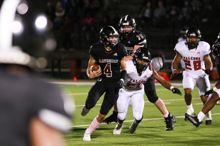 Lawrence High rolls to playoff victory over Wichita Heights | News ...